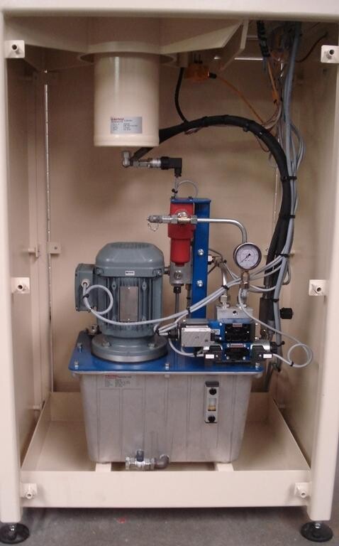 Hydraulic lab press used for pressing test plates of Trespa projects ...